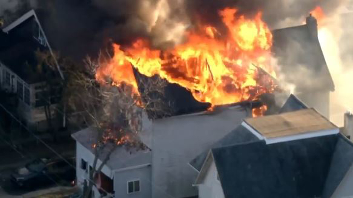 2 officers are wounded by gunfire at a suburban Philadelphia home that ...