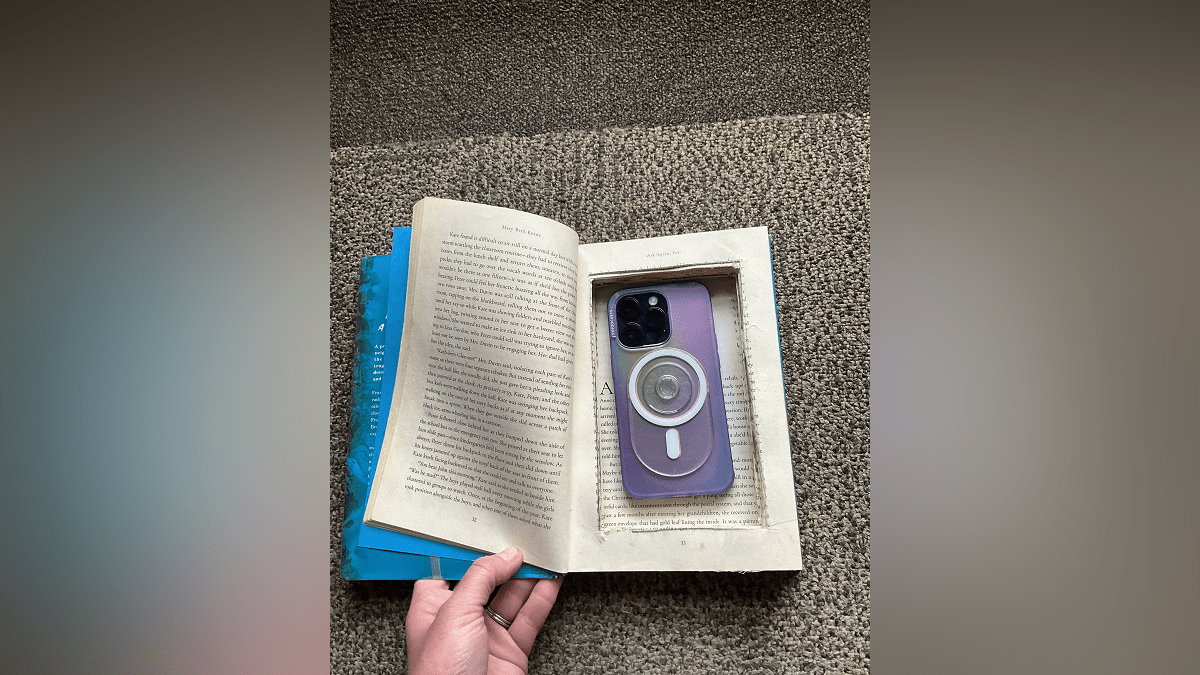 A librarian in Massachusetts is hiding burner phones in books to help ...