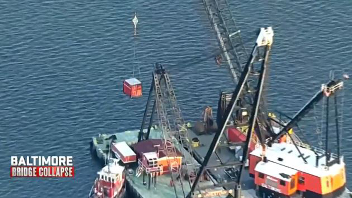 As cranes arrive at Baltimore bridge collapse site, governor describes ...