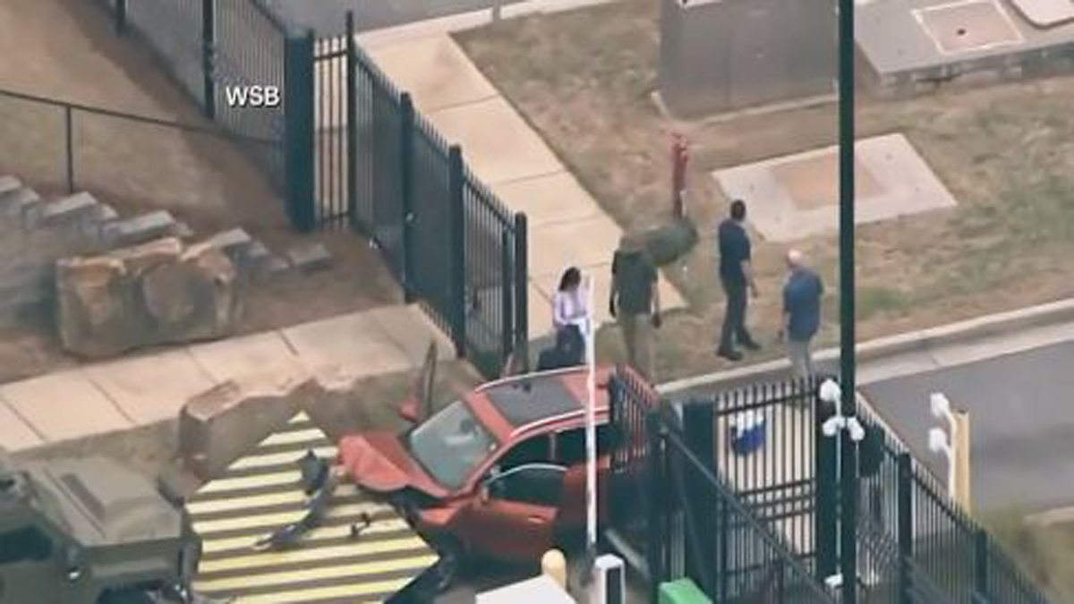 FBI says a driver rammed a vehicle into the front gate of its Atlanta ...