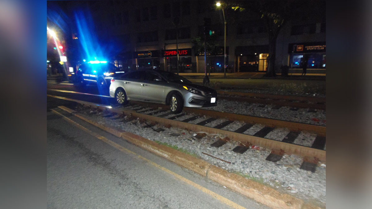 Police investigating after driver abandons car on Green Line tracks ...