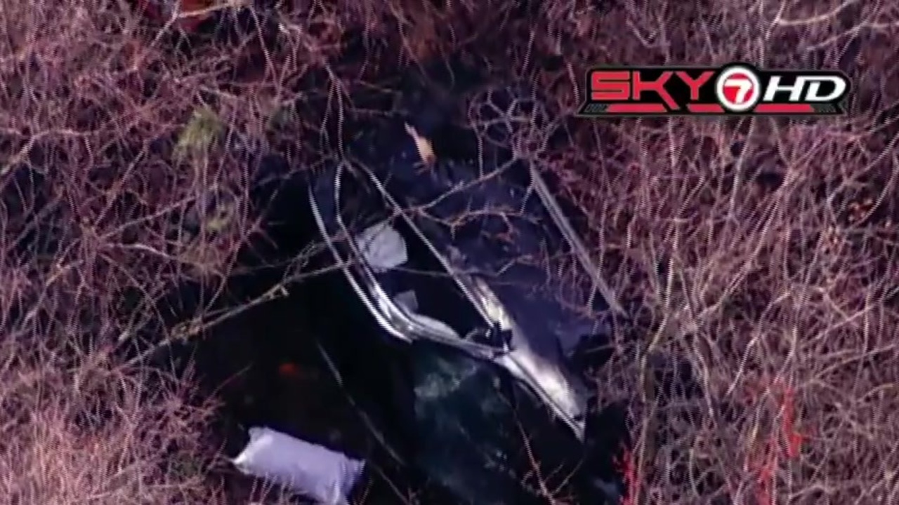 Police chase ends with car crashing into woods in Georgetown - Boston ...