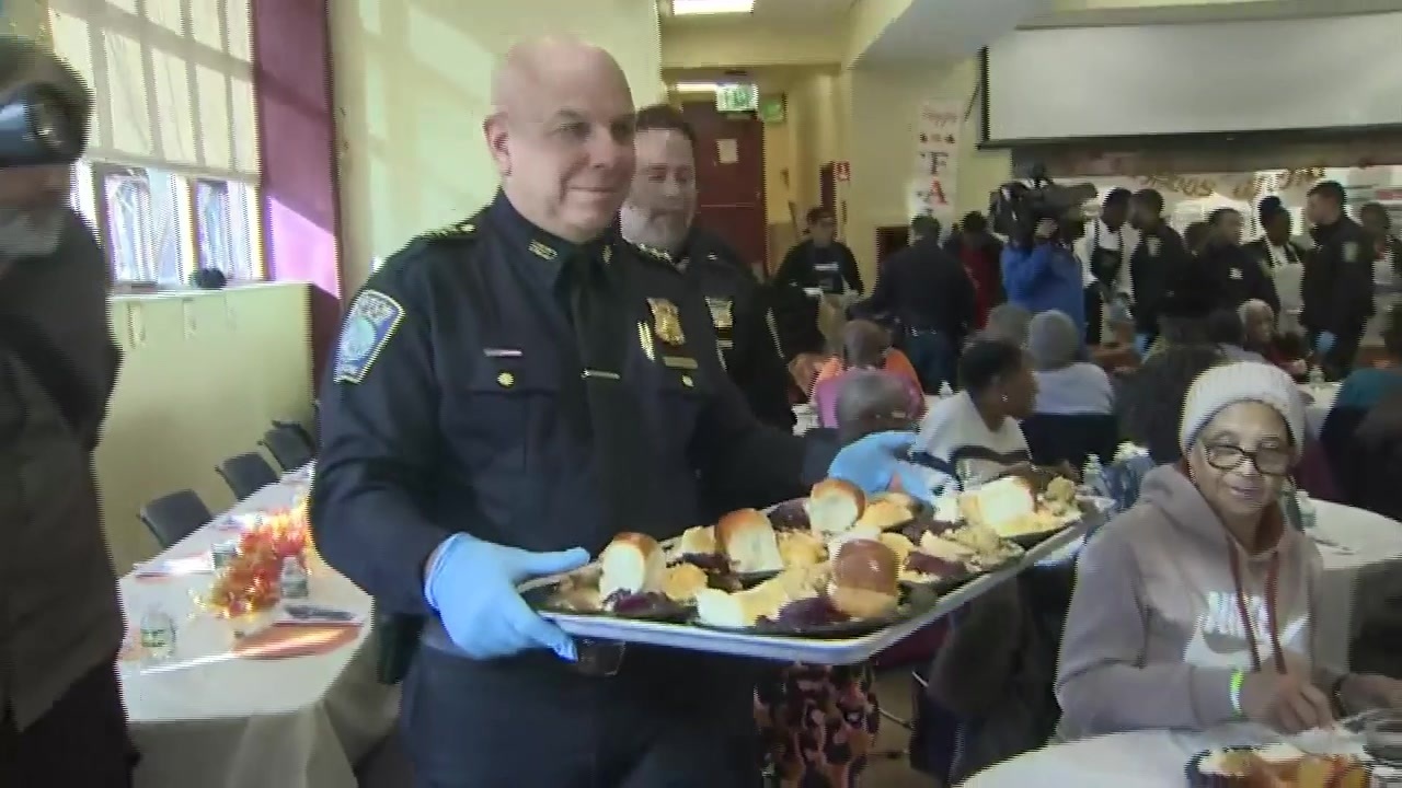 Boston police officers join Salvation Army to serve seniors an early ...
