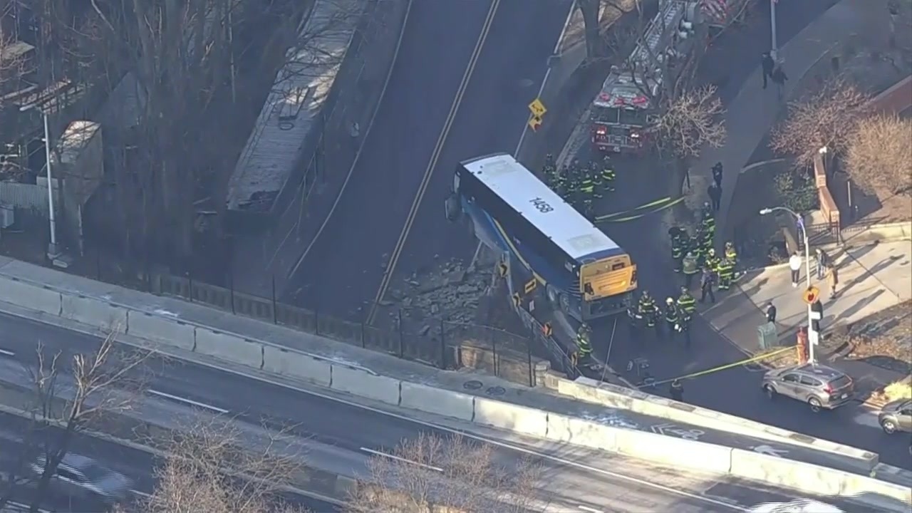 Front of NYC bus left hanging near a Bronx overpass after accident ...