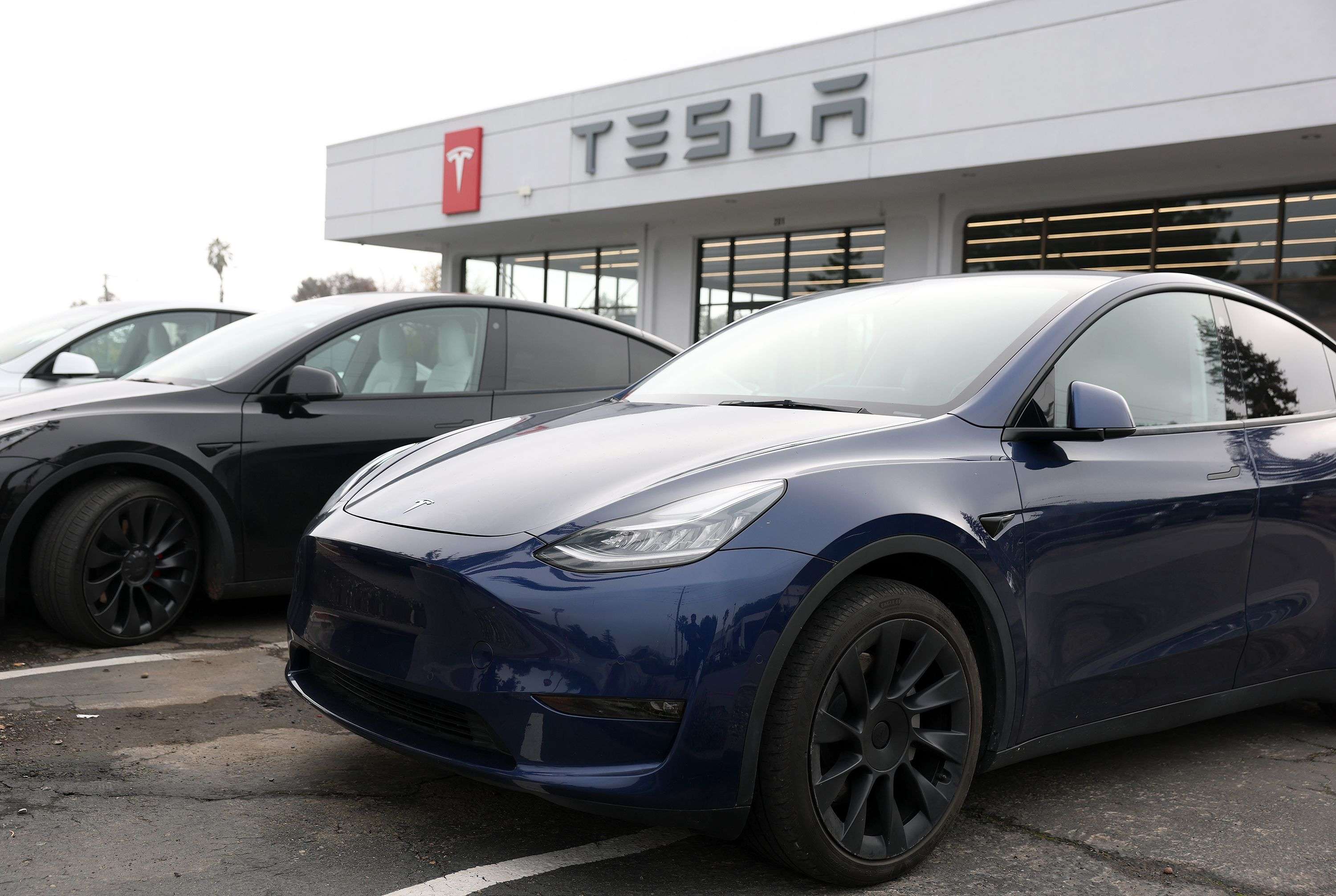 Tesla posts its first-ever annual sales drop - Boston News, Weather ...