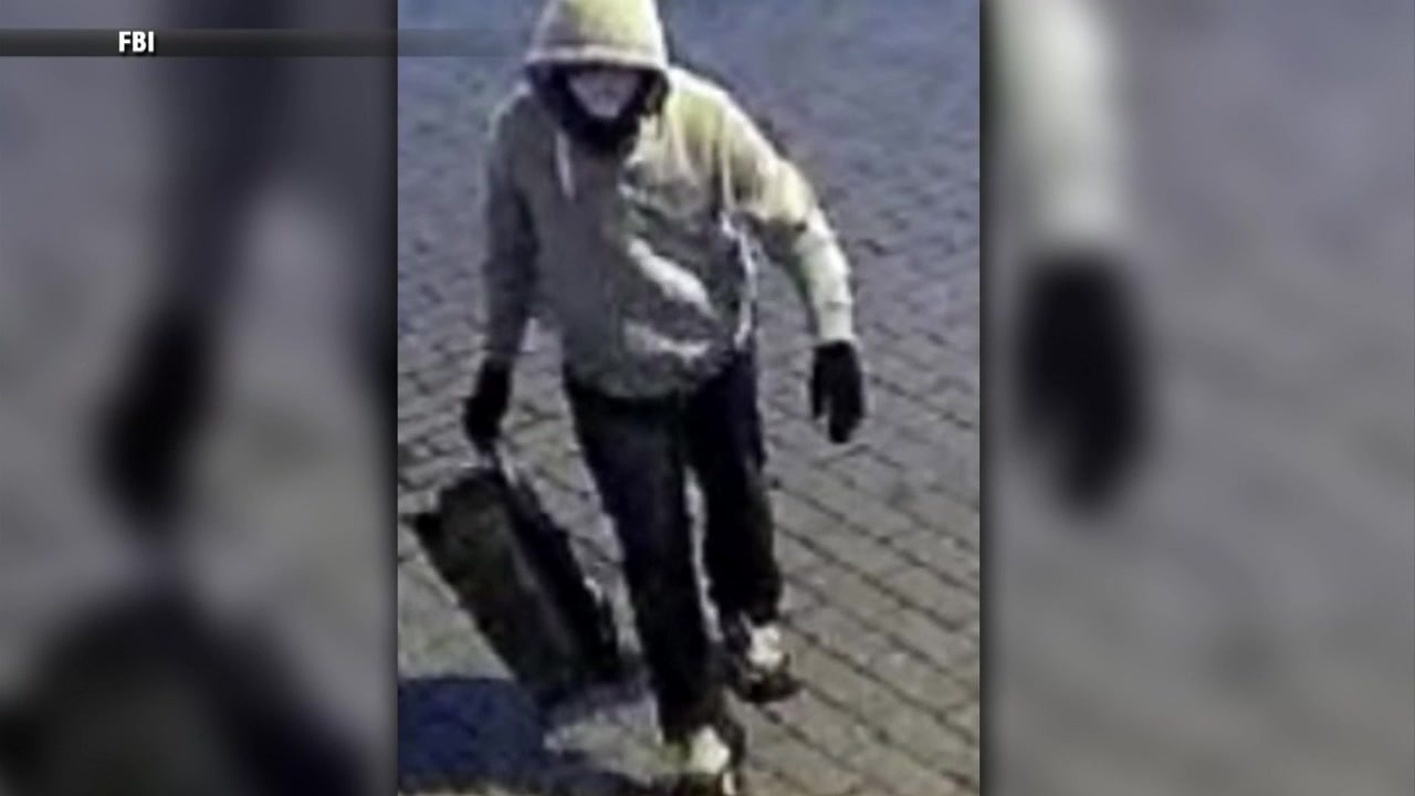 FBI releases new video of a suspect planting a pipe bomb near DNC ...