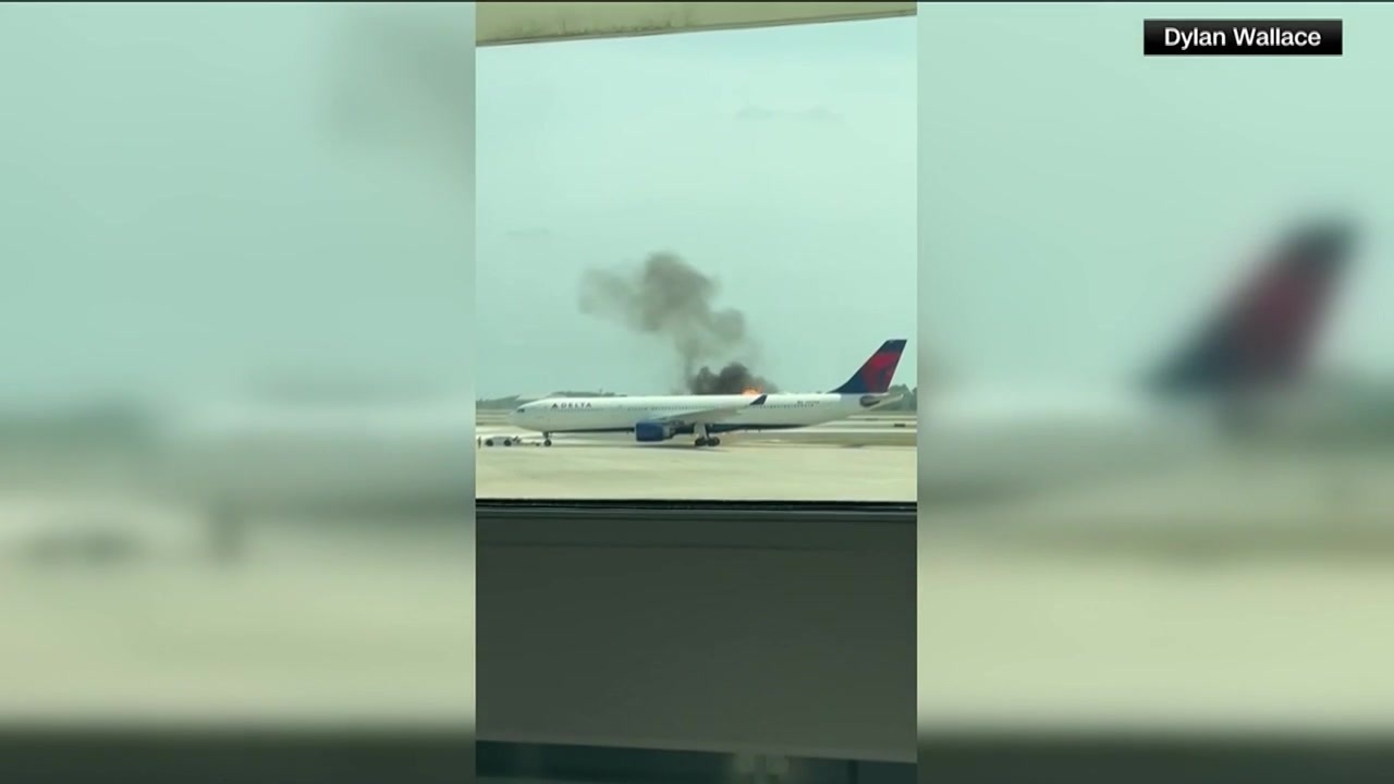 Delta plane catches fire at Orlando airport, forcing passenger ...