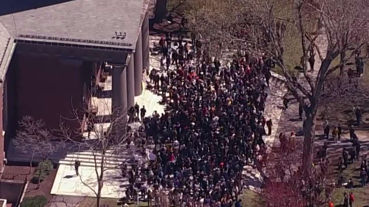 Protesters gather at Harvard University following Trump administration ...