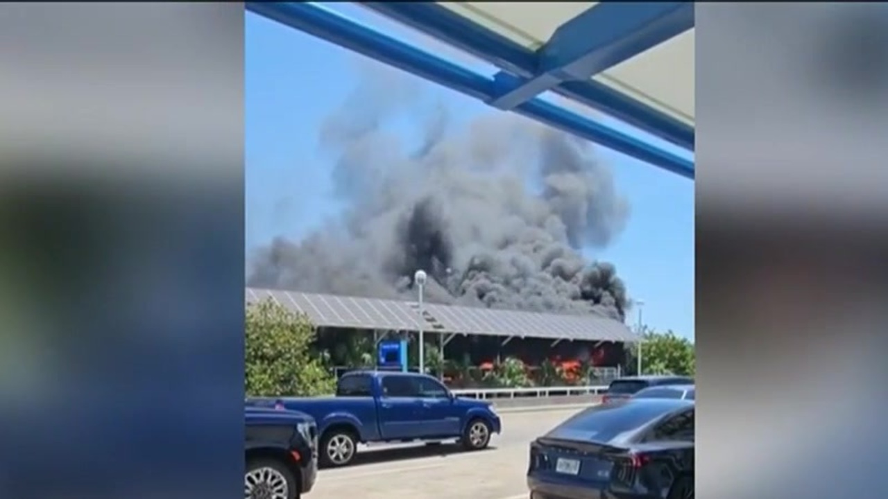 Florida airport closes after vehicle catches fire in parking garage ...