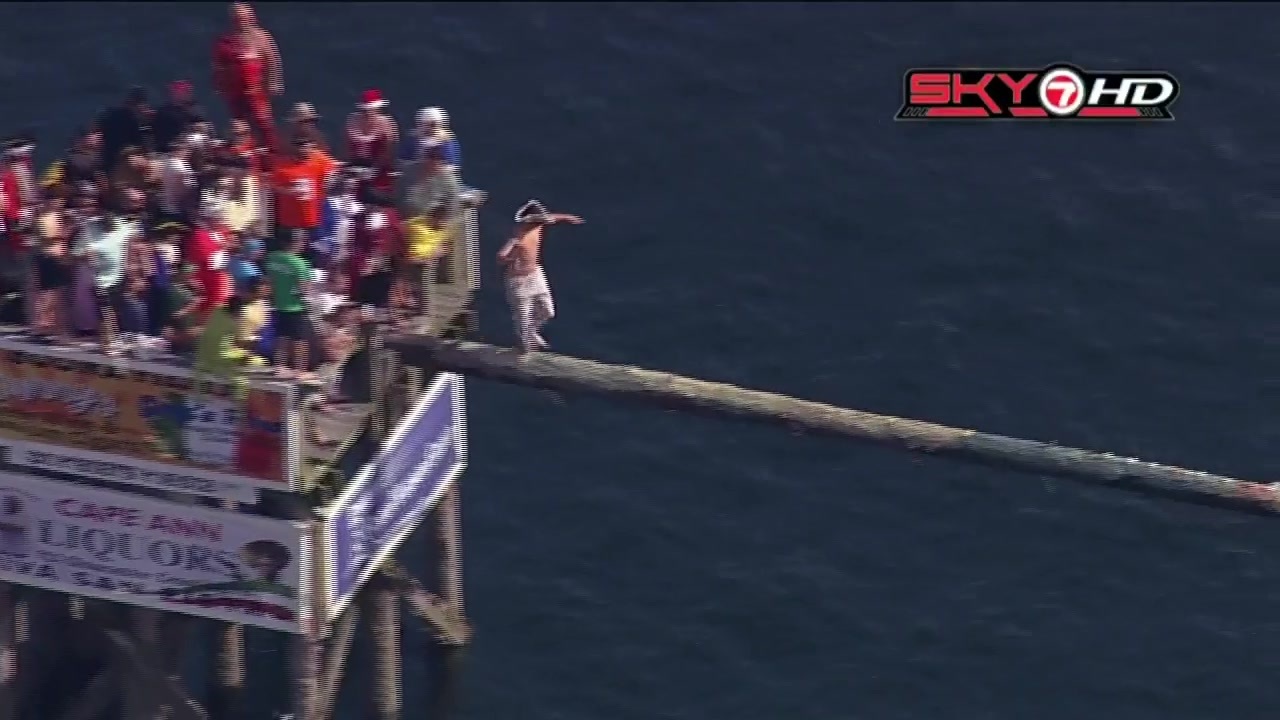 Participants compete in Gloucester’s annual ‘Greasy Pole Competition ...