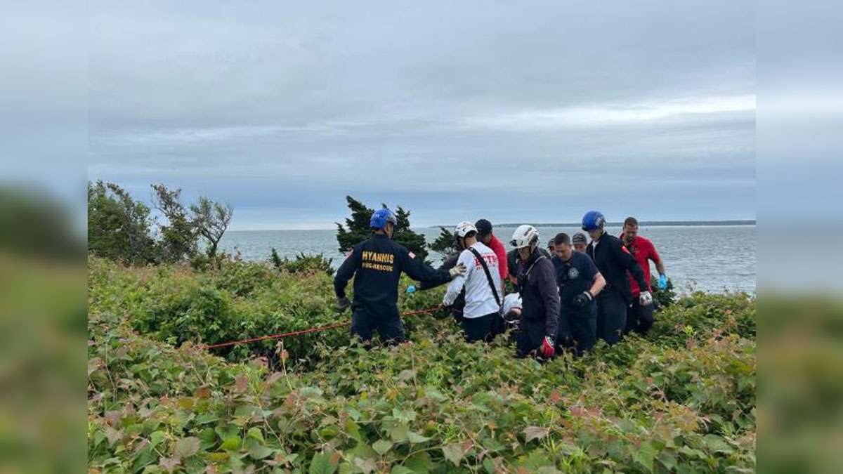 Falmouth firefighters rescue person who fell down embankment on steep ...