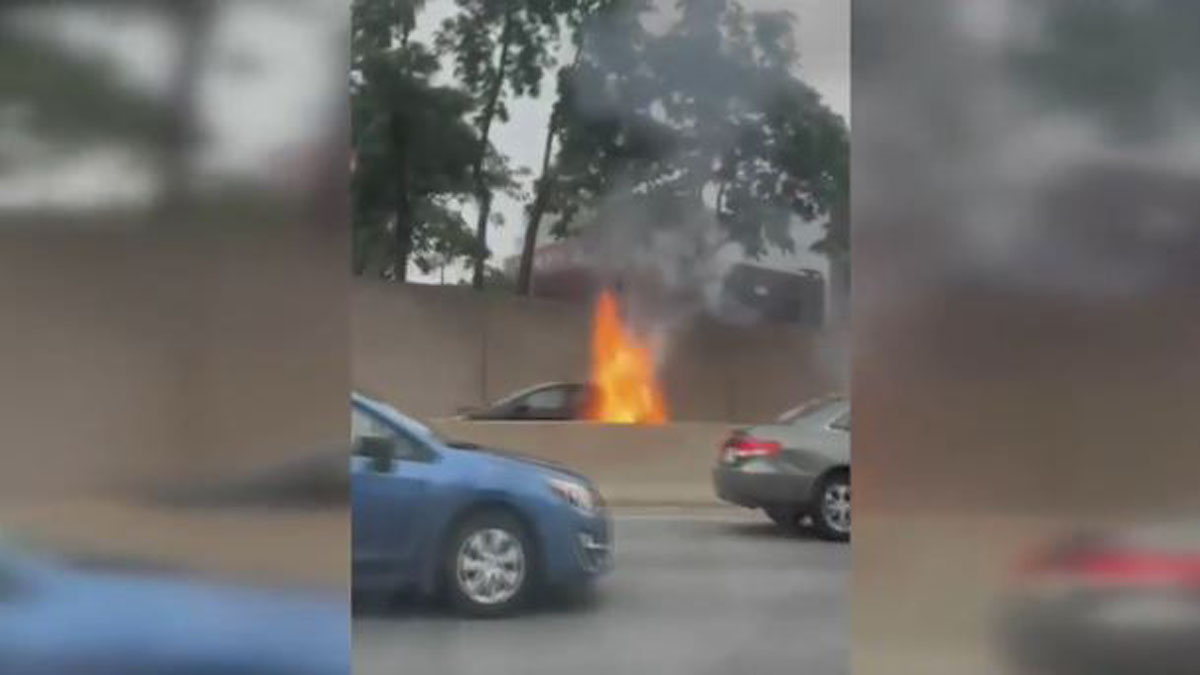 Electric car fire temporarily closes Pike in Boston, causes major ...