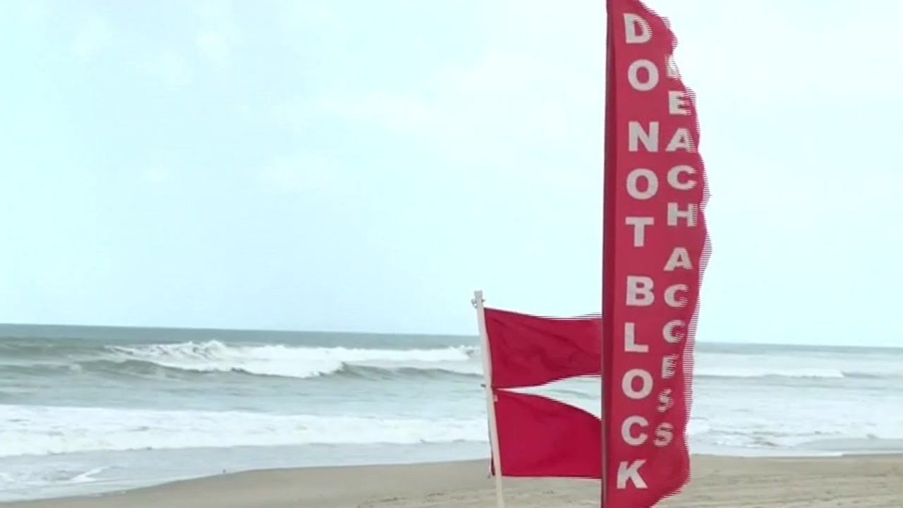 Hurricane Erin stirs up strong winds and floods part of a NC highway as ...