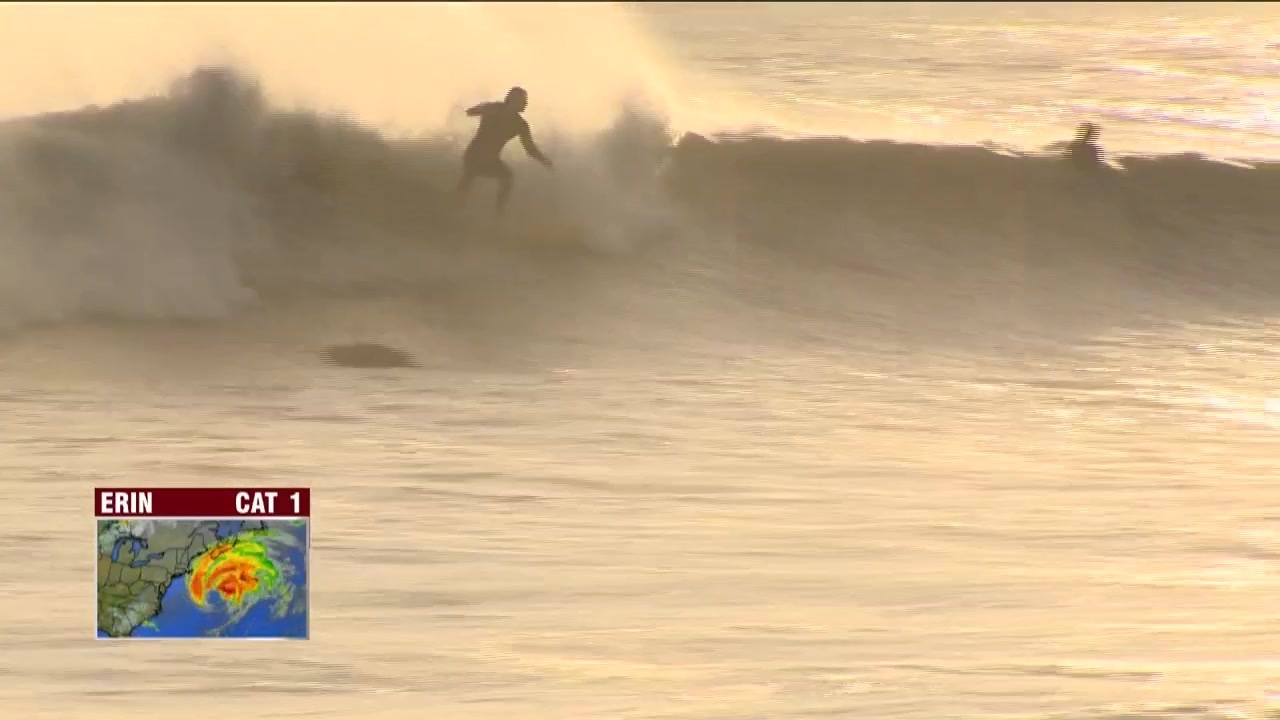 Surfers at Horseneck Beach ride waves churned up by Hurricane Erin ...