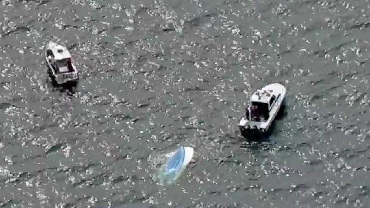 WATCH: 2 people rescued after boat overturns in Beverly - Boston News ...