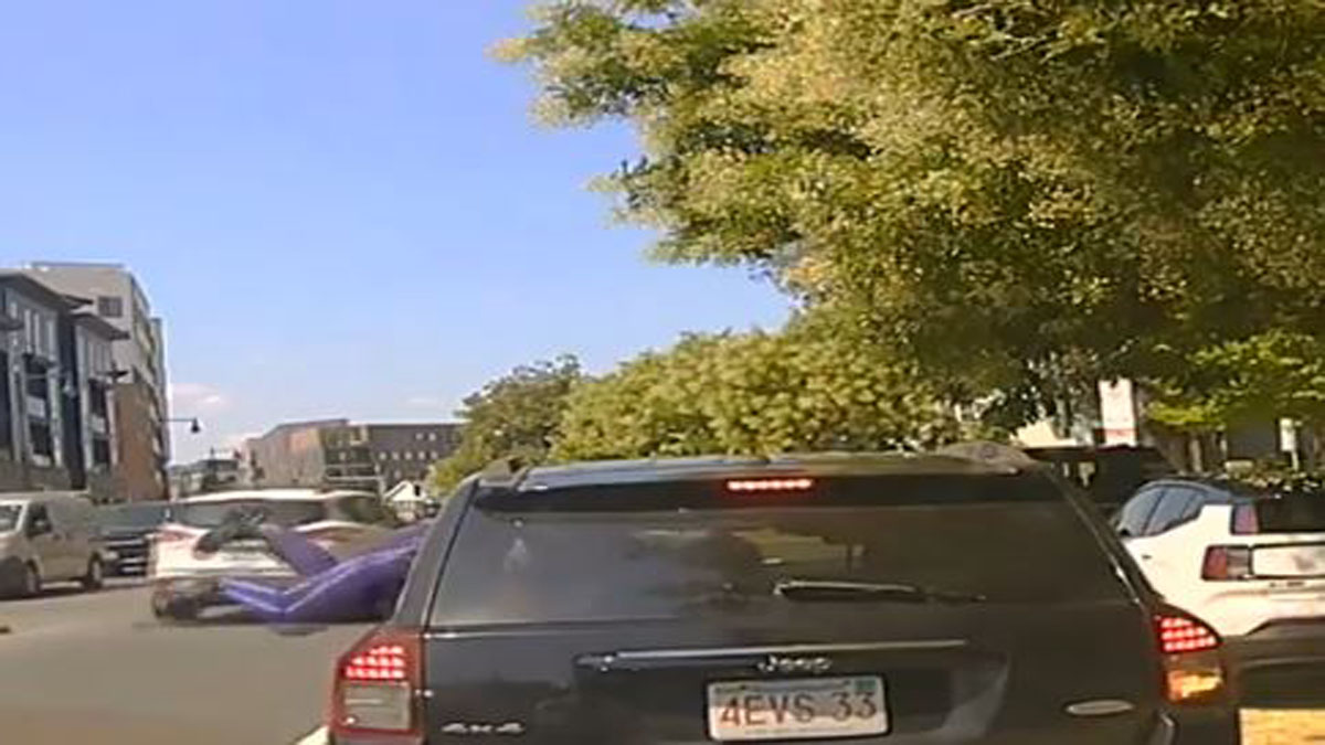 WATCH: Video shows trooper hanging out car window before arresting city ...