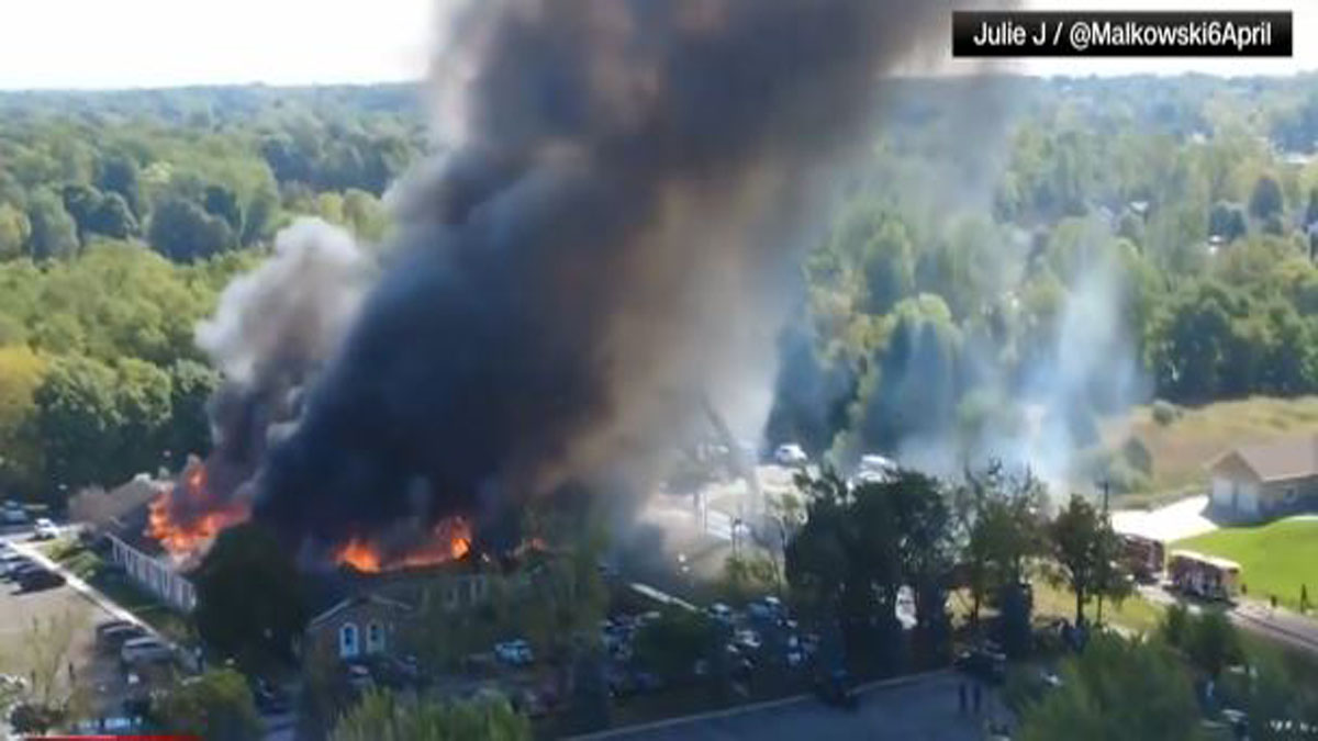 Police remain on scene at burned out Michigan church after shooting and ...