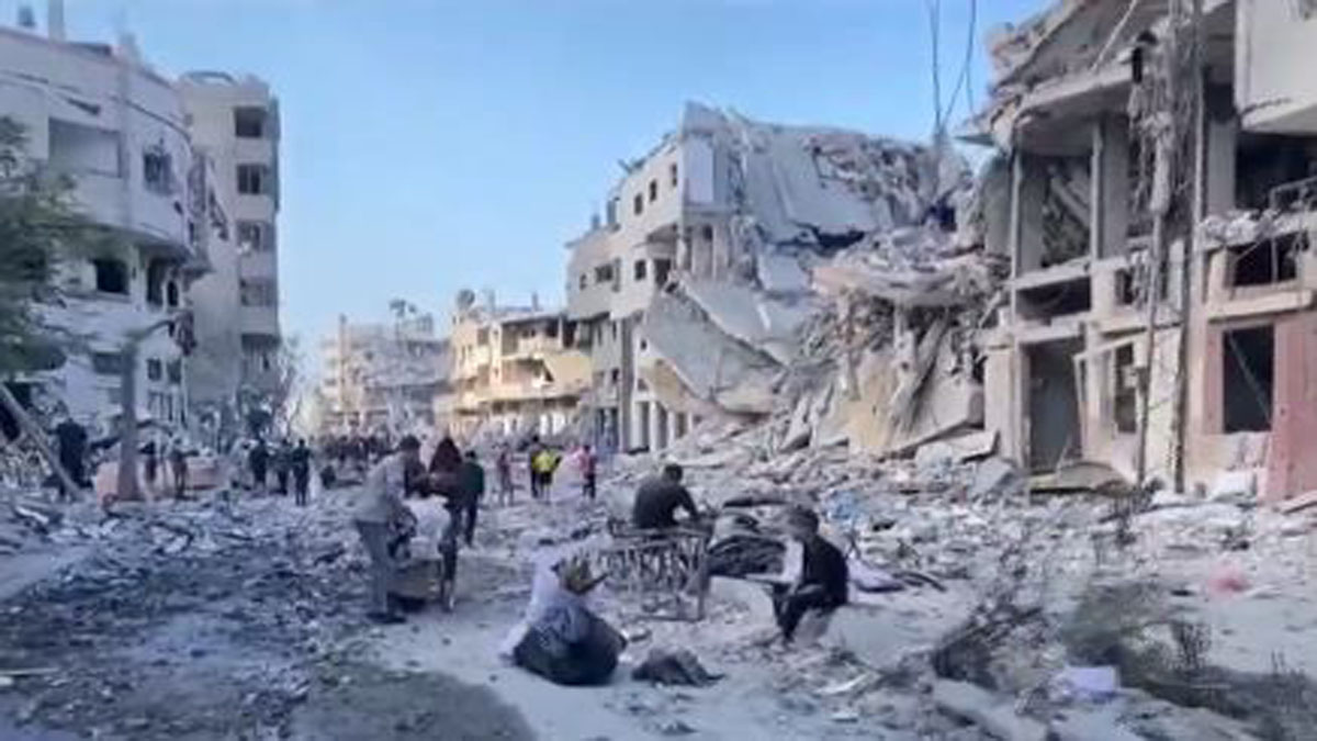 Israel fires mortar into Gaza residential area, wounding at least 10 ...