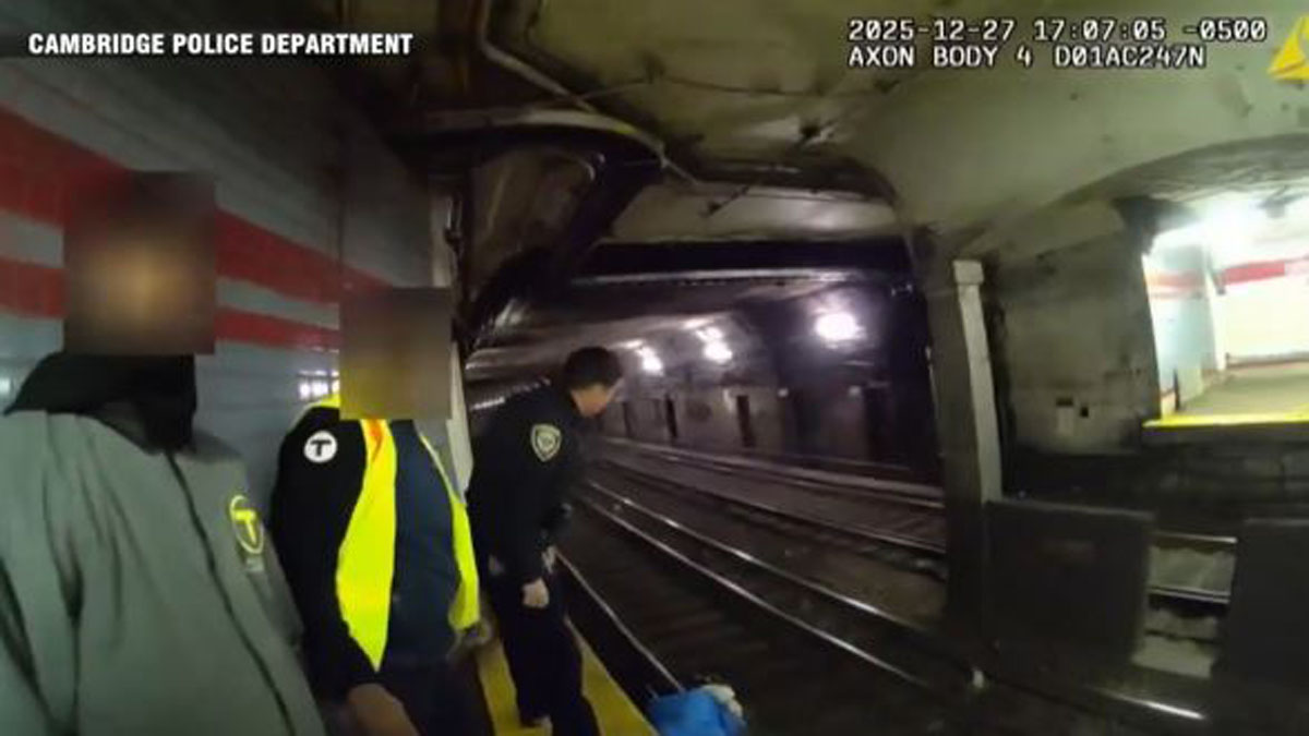 Body camera video shows Cambridge police rescuing man who fell onto Red ...