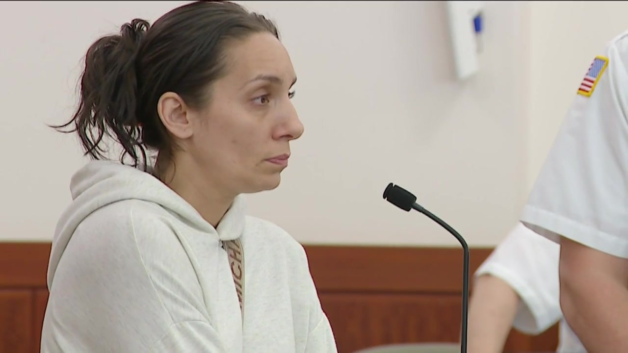 Woman arrested after running into burning home in Worcester ...